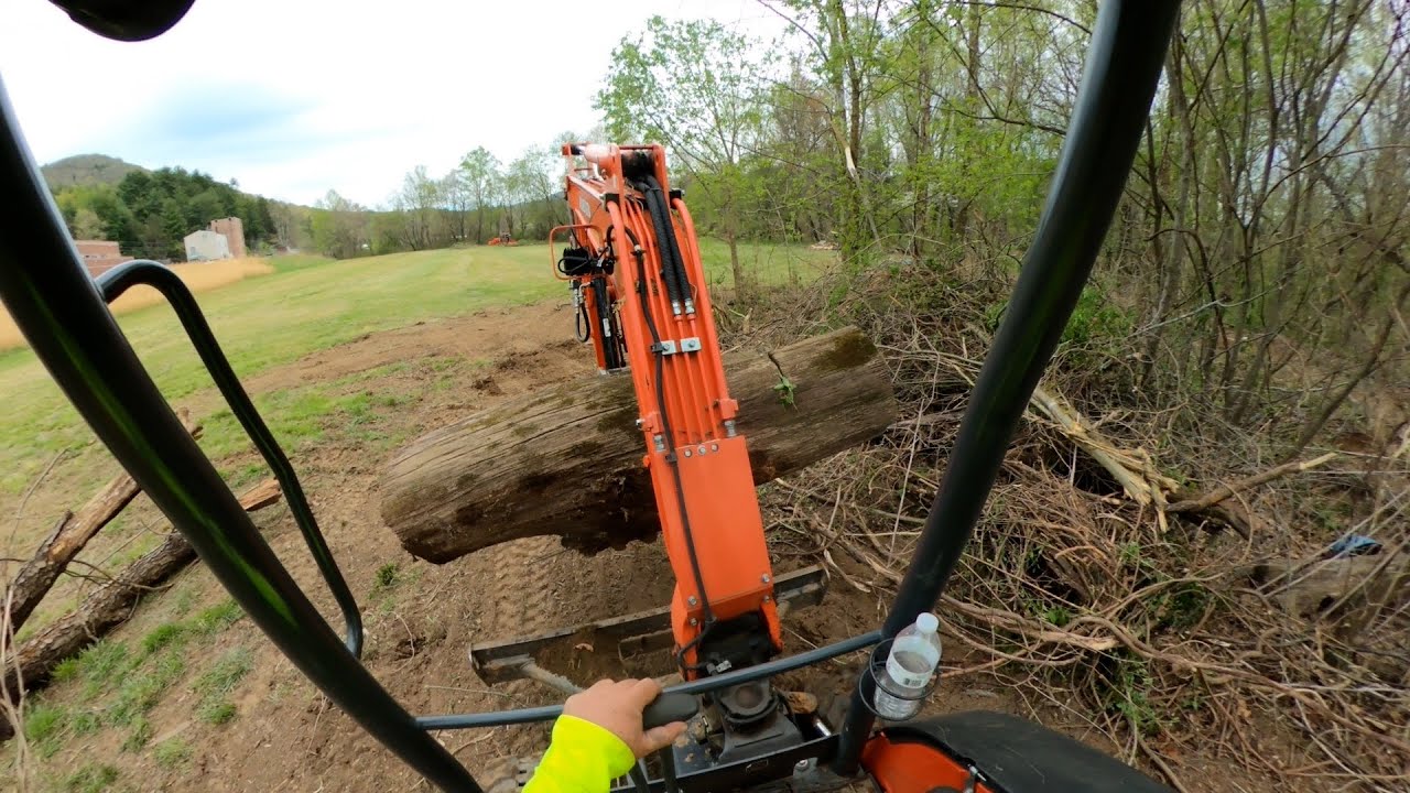 Excavator work around a field's edge, part 4 of 5 - YouTube