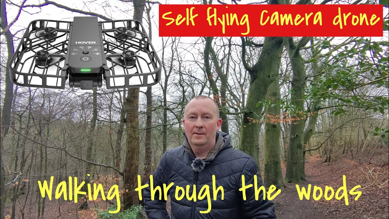 Walking through the woods with a SELF FLYING camera drone in Kidsgrove ...