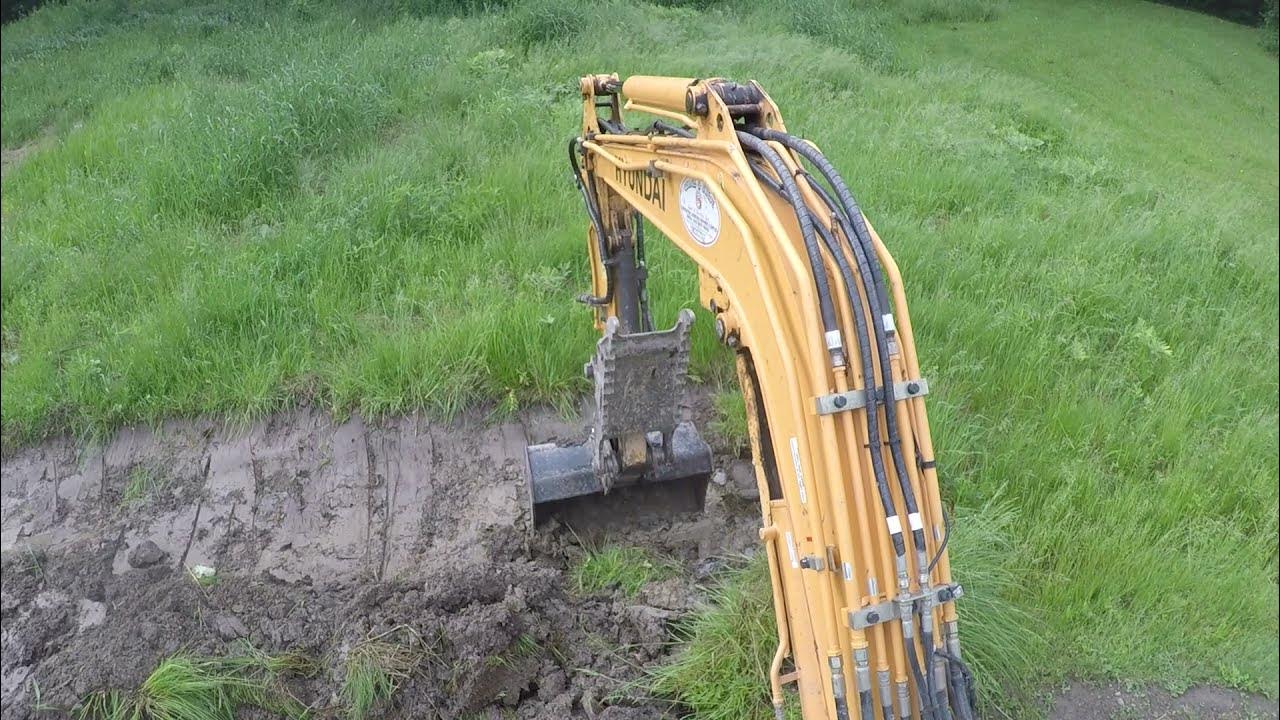 Cleaning Out Ditch with Mini Excavator - YouTube