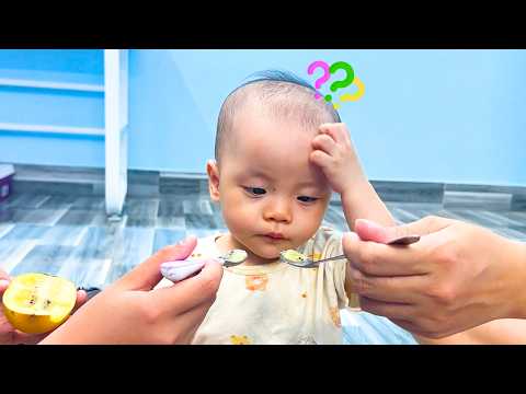 Baby Kim is hesitating as both her mother and Quynh try to feed her