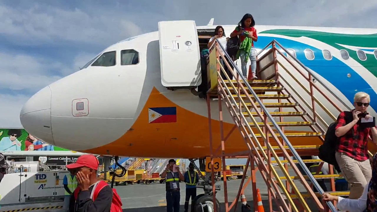 Arriving in NAIA Terminal 3 - Deplaning to Baggage Claim - YouTube
