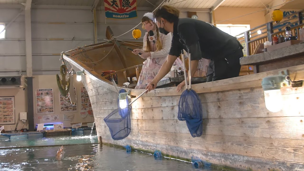 Eating at the Fishing Restaurant in Japan. It has a full BOAT inside ...