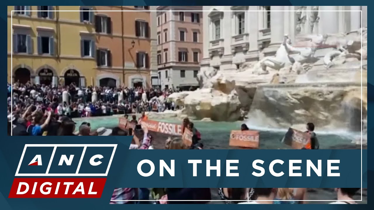 Climate activists turn Trevi Fountain waters black in protest vs gov't ...