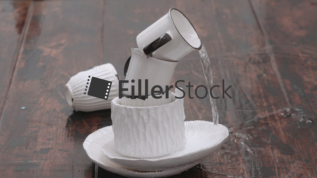 Falling cups with rainwater - YouTube