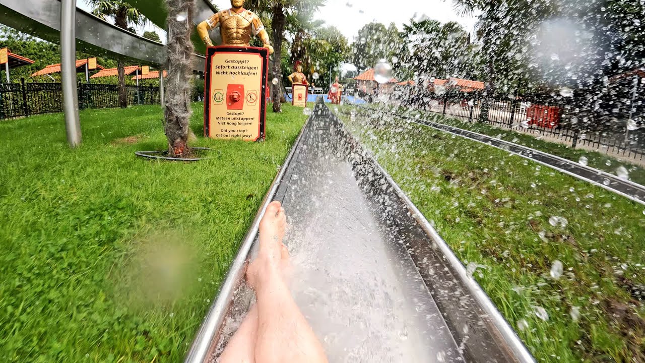 Strange Dueling Water Slides Across the Lawn at Irrland - YouTube