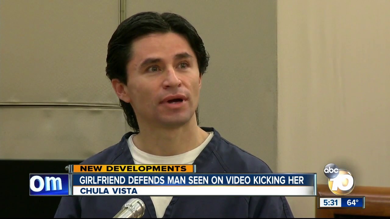 Girlfriend defends man seen on video kicking her - YouTube