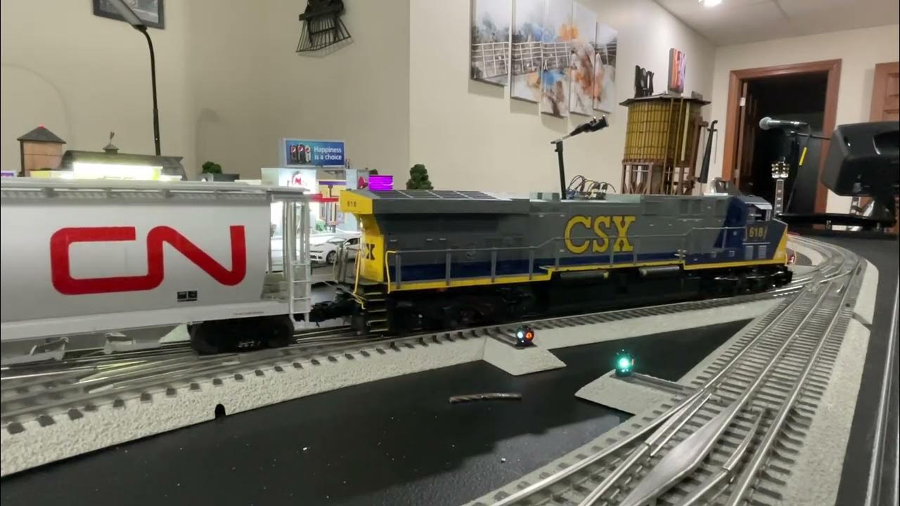 Lionel Legacy AC6000 CSX 618 backing a train into the yard. Great sounds! - YouTube