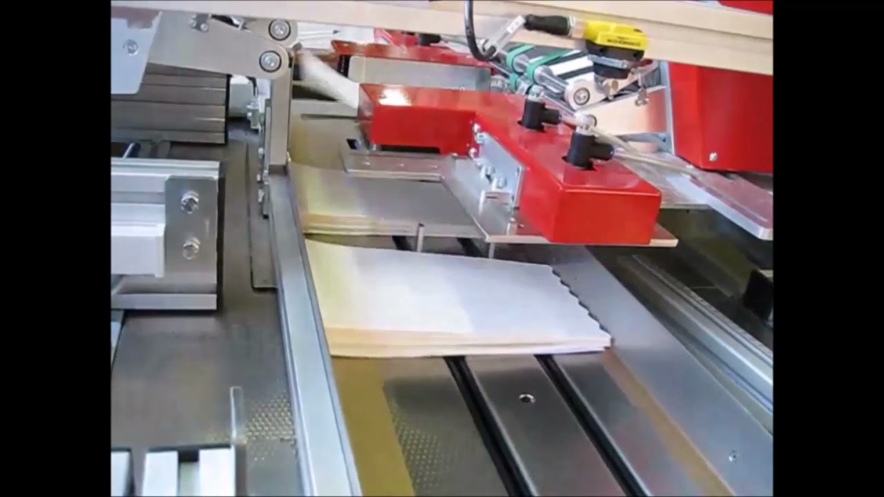 Kraus joker feeding stacks into bvm adpak shrink wrapper - YouTube