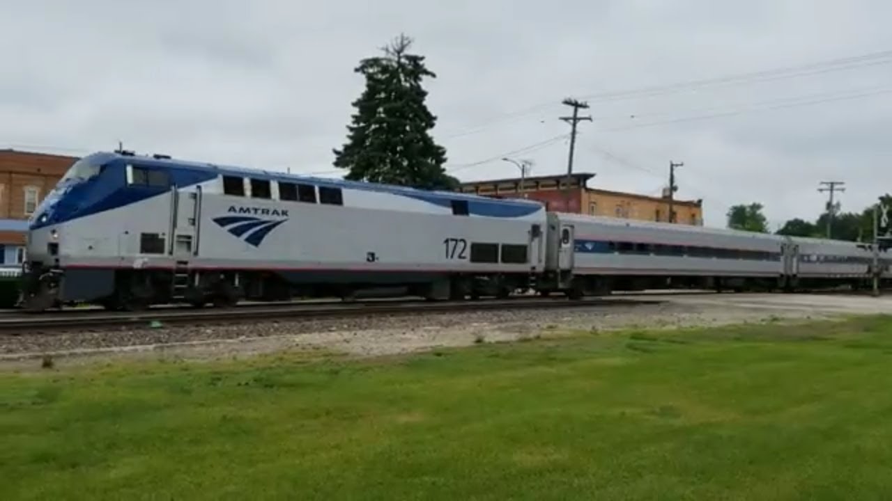 AMTRAK'S CARL SANDBURG ARRIVING IN PLANO IL BEHIND A P42 - YouTube