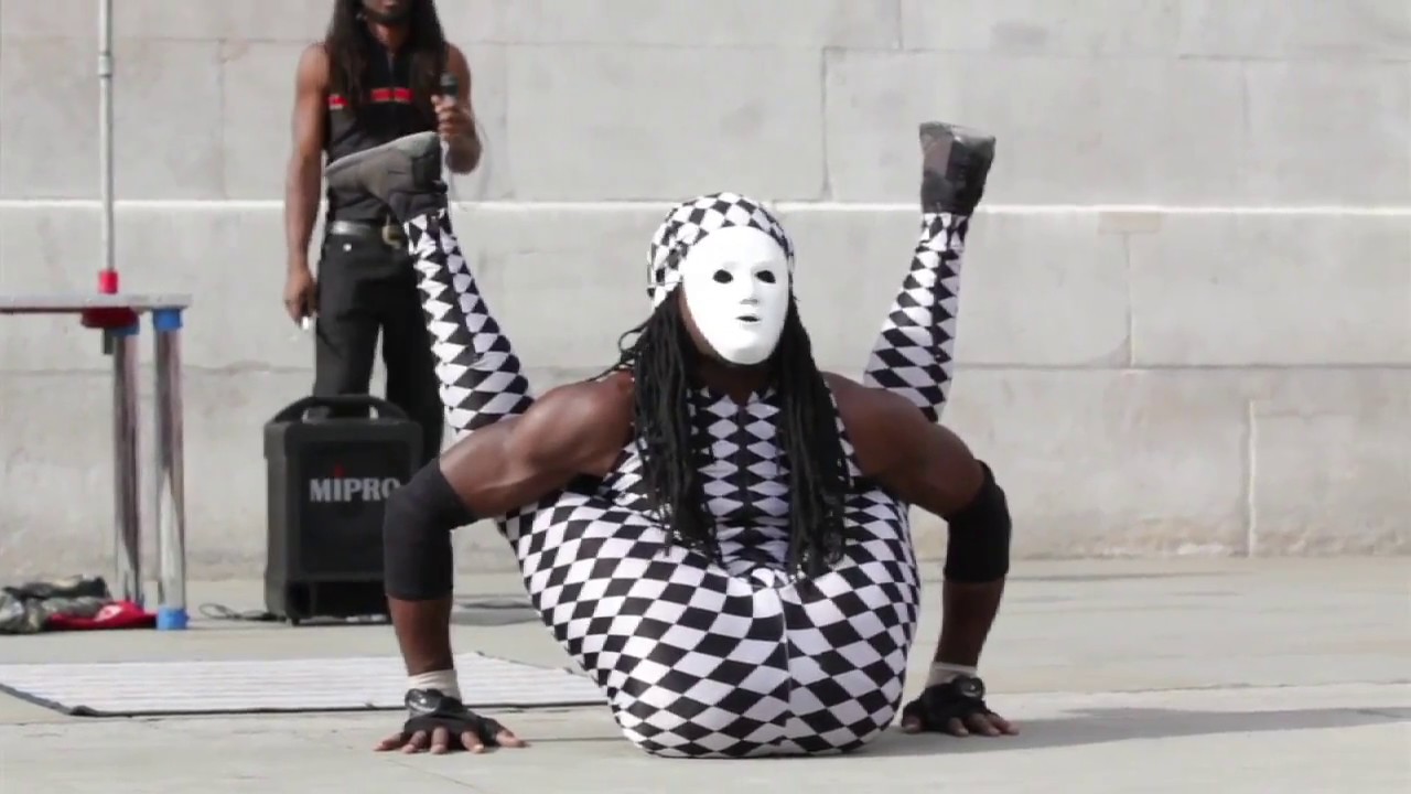 Absolutely insanely talented contortionist in Trafalgar Square - YouTube
