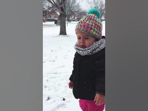Baby doesn’t like the snow - YouTube