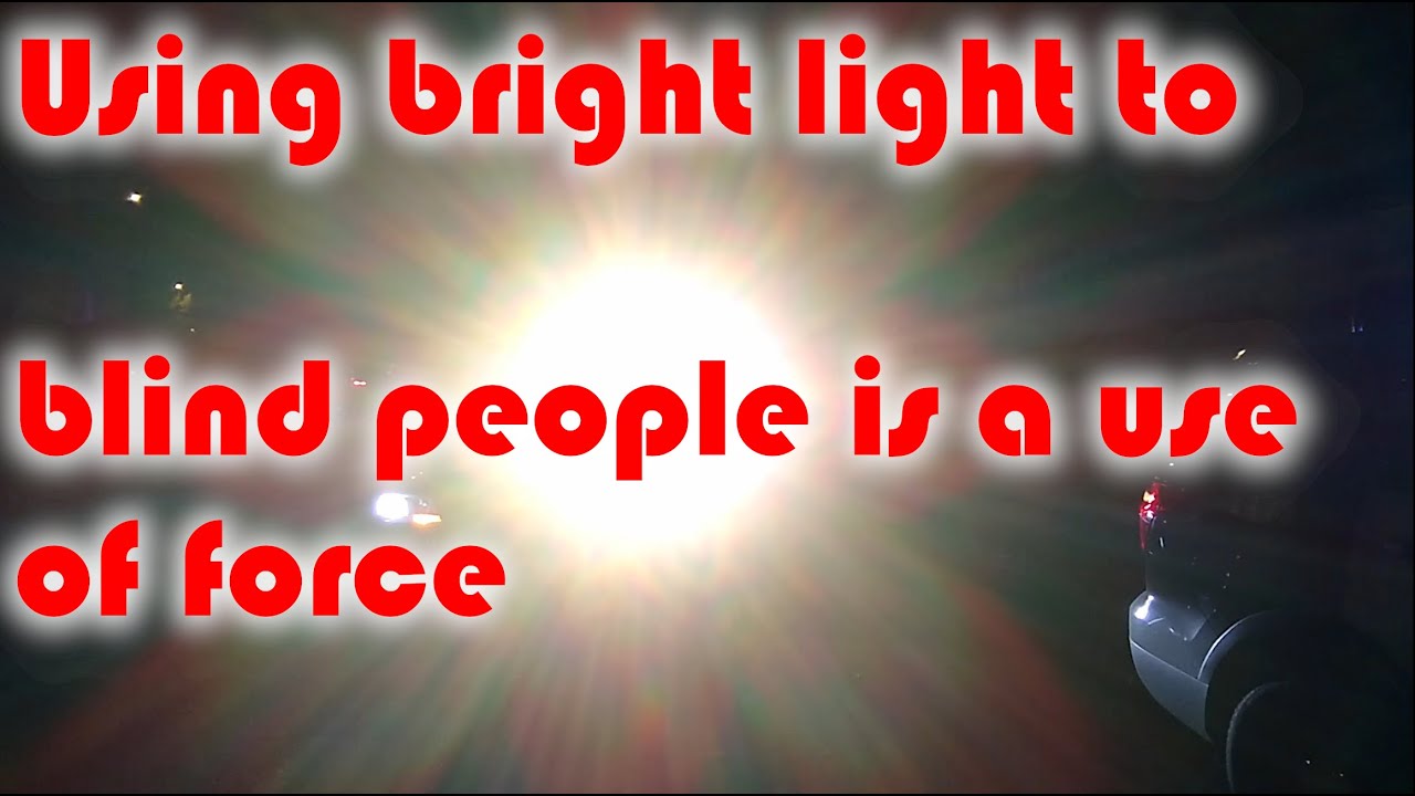 Police officers using light as a weapon. Use of light as force ...