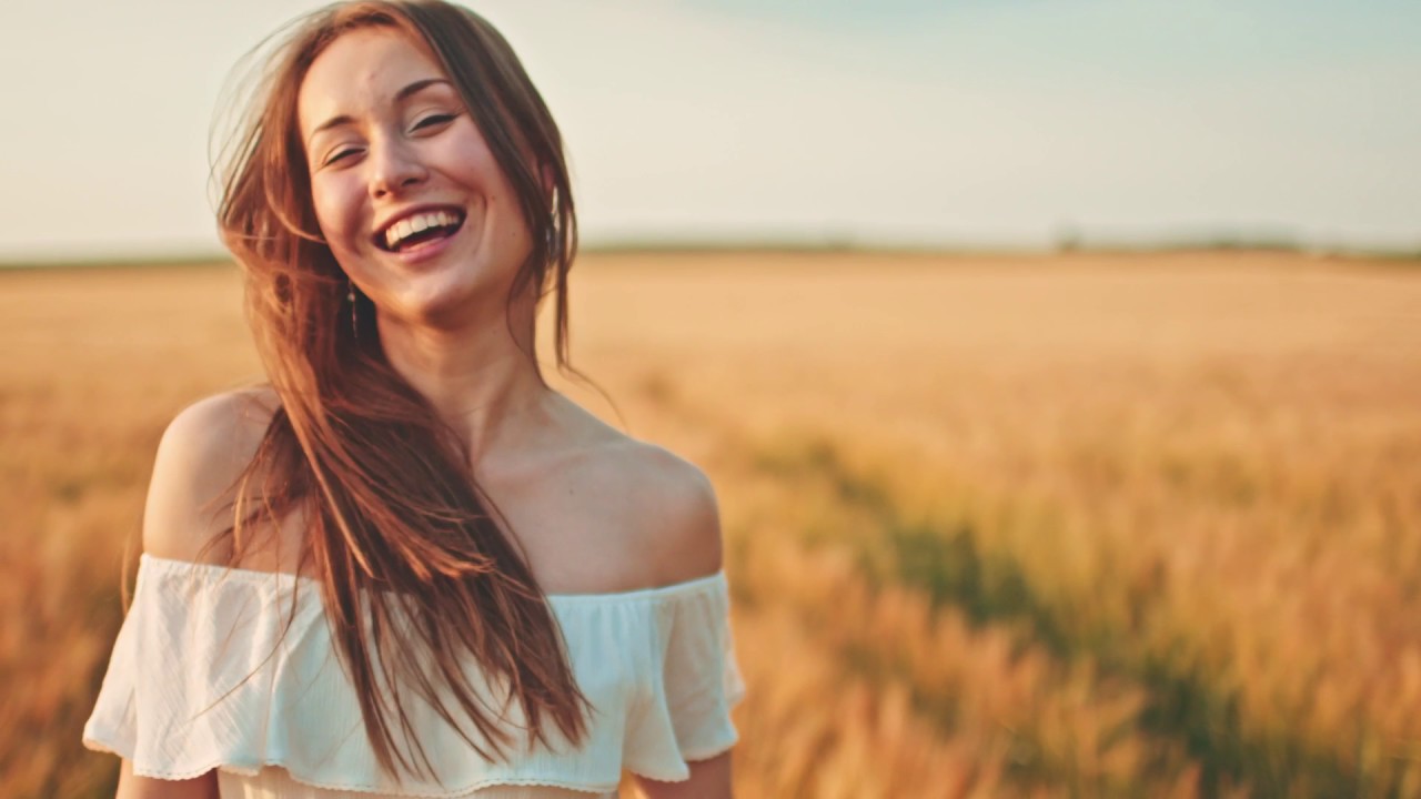 Beautiful girl running on sunlit wheat field slow motion 02 - YouTube