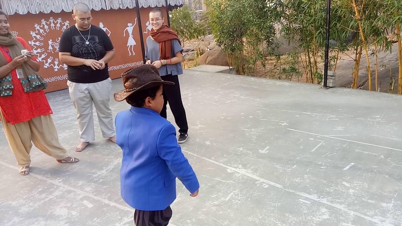 Adla Satish Kumar explaining the lattu bongaram top game to ...
