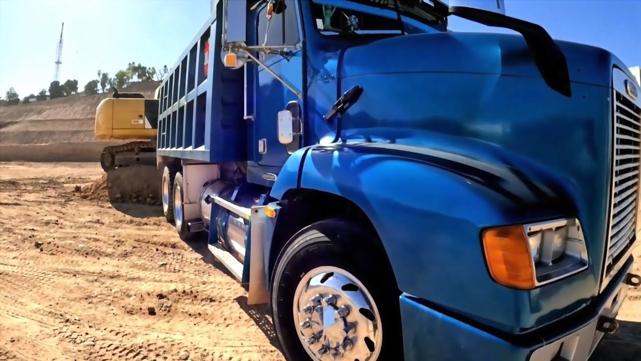 Excavator Loading Dump Trucks: Operator POV - YouTube