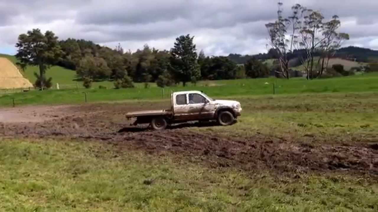 Mazda bounty ripping up in paddock - YouTube
