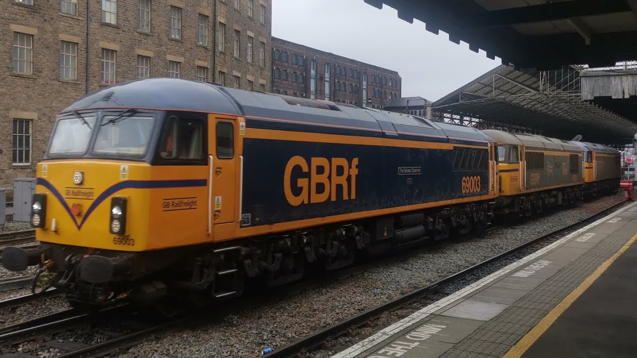 69003, 69001 and 69006 with many tones pass Huddersfield Station (10/2 ...