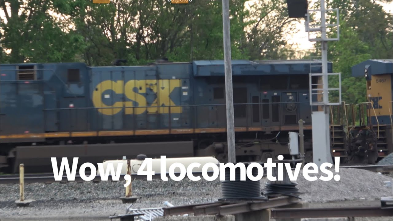 Fostoria, OH. CSX railway autorack train w/ 4 locomotives. 5223, 5467 ...