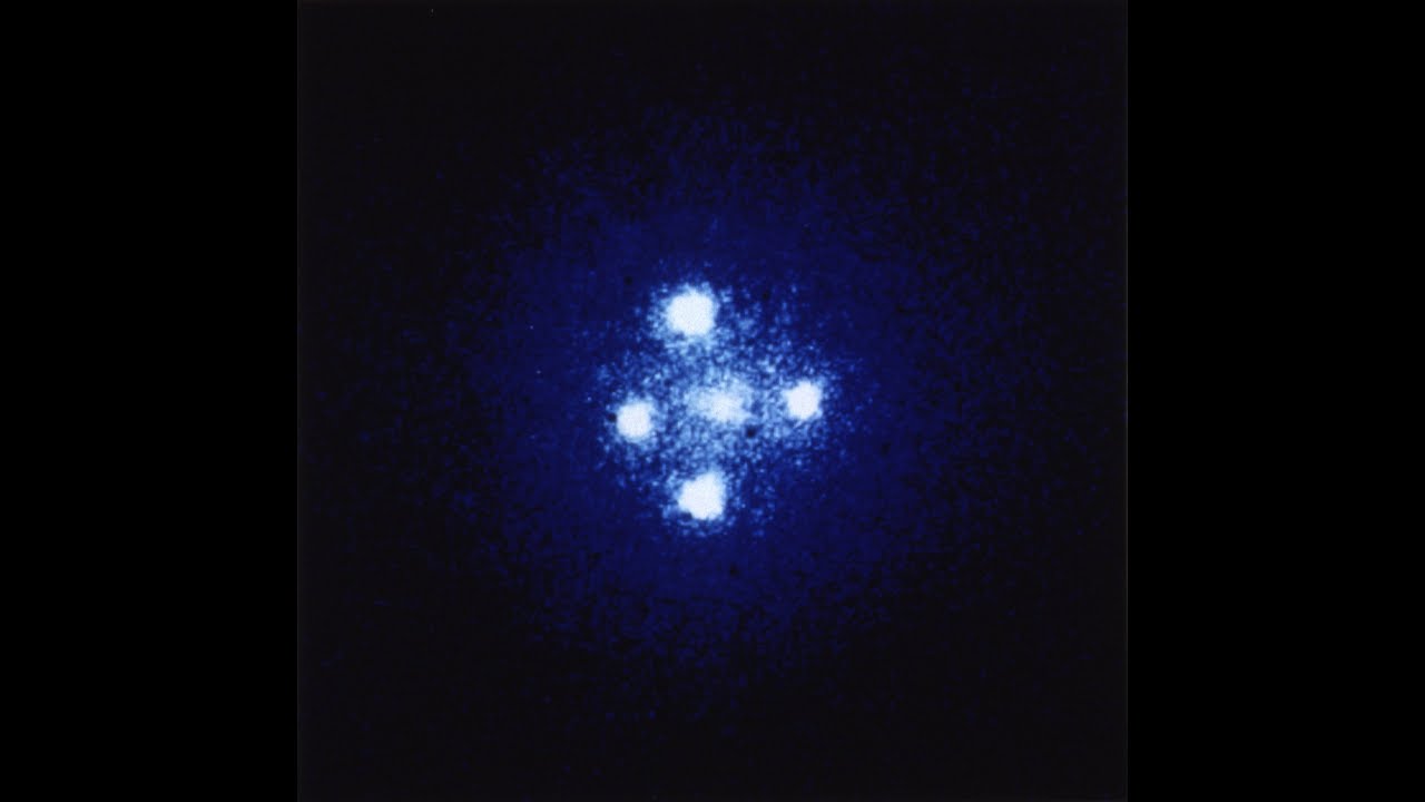 What is the Einstein Cross phenomenon in the cosmos? - YouTube