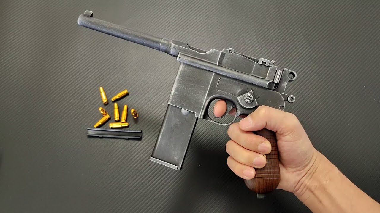Mauser 1932 C96 Shell Ejecting Laser Toy Gun Review 2024 - YouTube