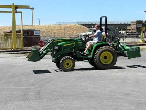 John Deere Tractor with 300X Loader and iMatch Tiller - YouTube