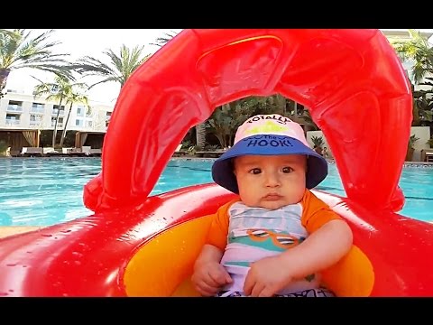 BABIES FIRST TRIP TO THE POOL - YouTube