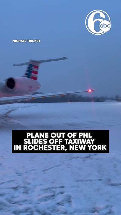 Plane out of Philadelphia International Airport slides off taxiway in Rochester, New York - YouTube