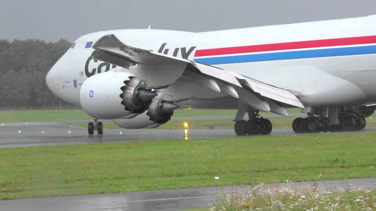 Cargolux 747-8F take off in heavy rain - YouTube