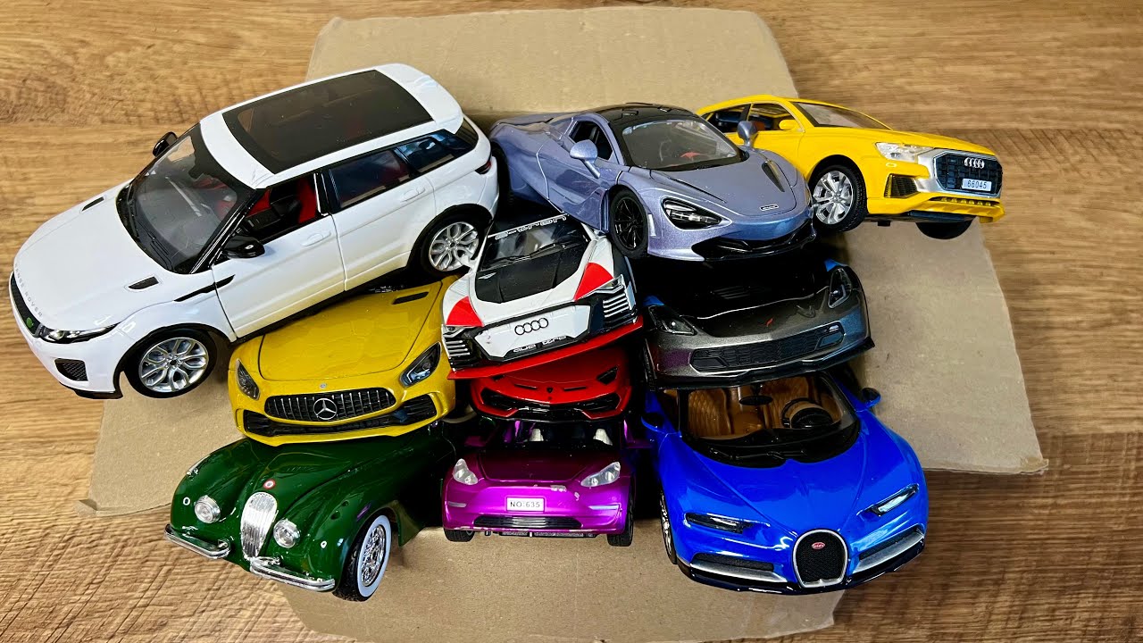 Box Full of Diecast Model Cars: Toyota Camry, Mercedes G500, Bugatti ...