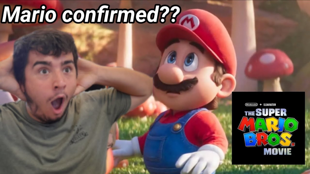 a group of guys sit on the floor and watch the new mario movie trailer ...