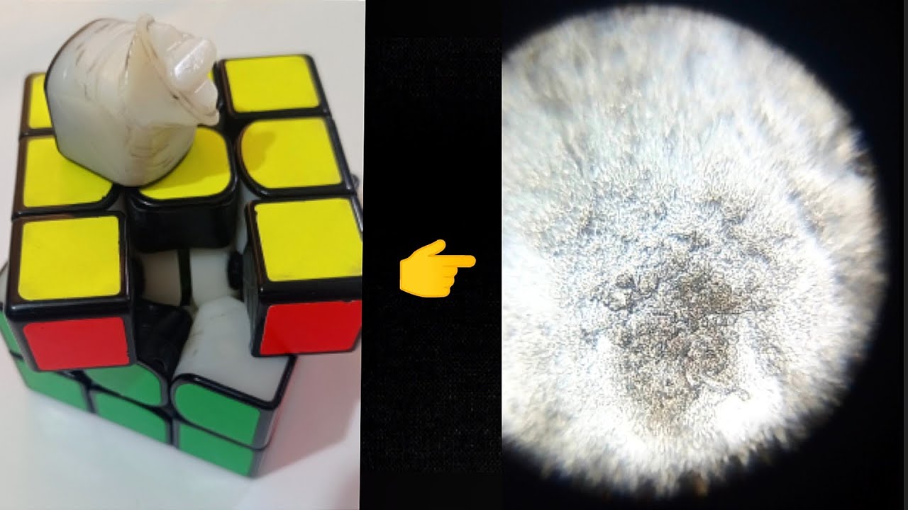 Cube dust under a microscope - YouTube