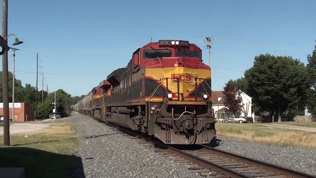 KCS 4010 Leads a KCS Grain Train West through Higginsville, MO with a ...