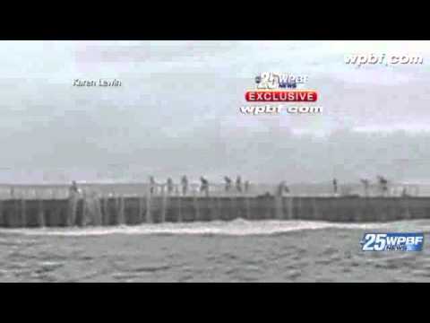 Exclusive: Wave Crashes Over People On Jetty - YouTube