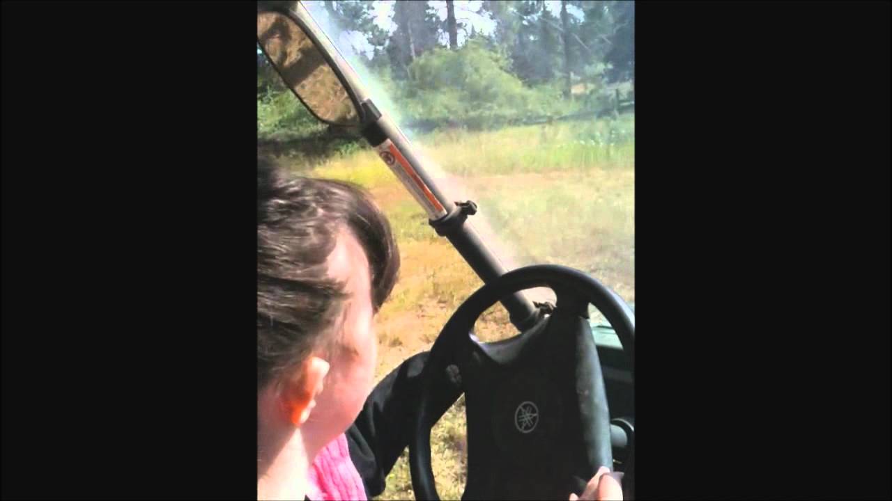 Blind student driving a car on in the mountains-reached braille reading ...