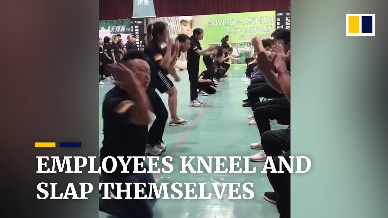 Employees kneel and slap themselves in a bizarre training in China ...