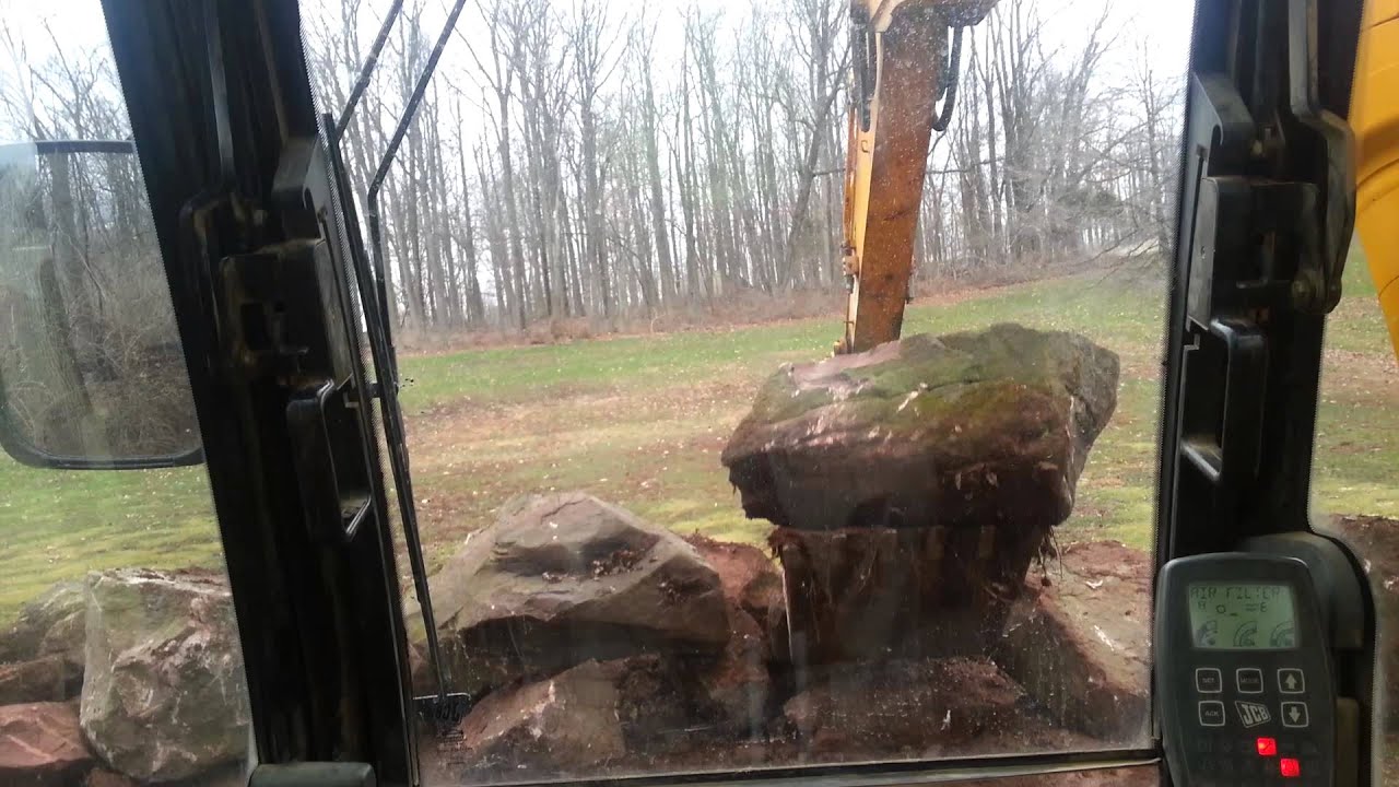 JCB JS160 - Pulling Rocks - YouTube