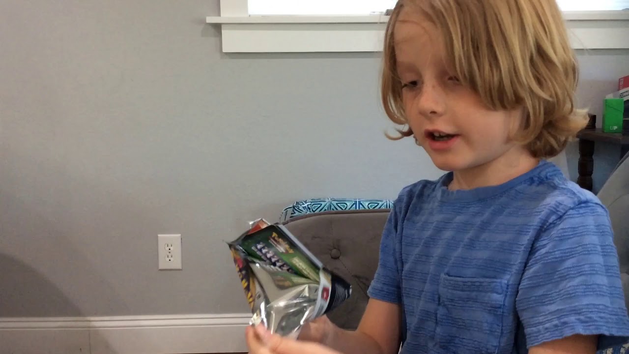 Darwin opens Pokemon cards - YouTube