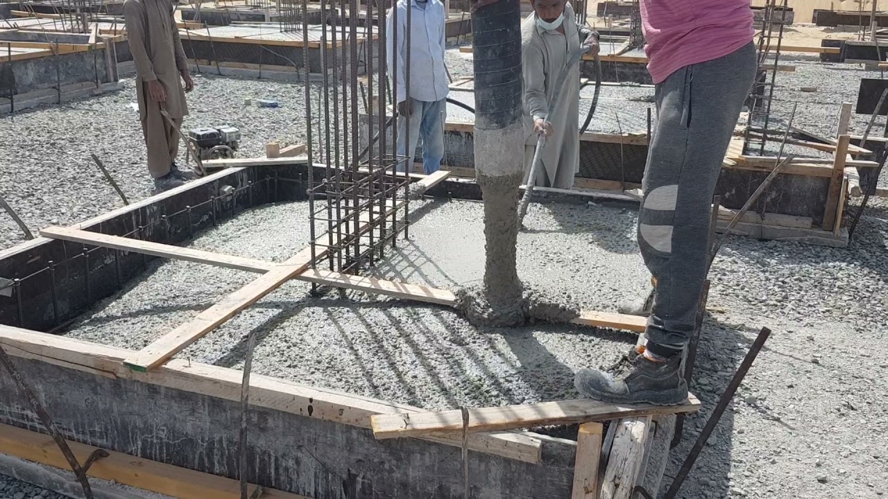 Self compacting concrete pour on a foundation footing by concrete pump ...