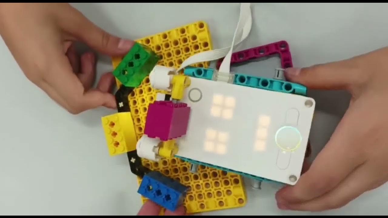 robô feito com sensor de cor spike prime - YouTube