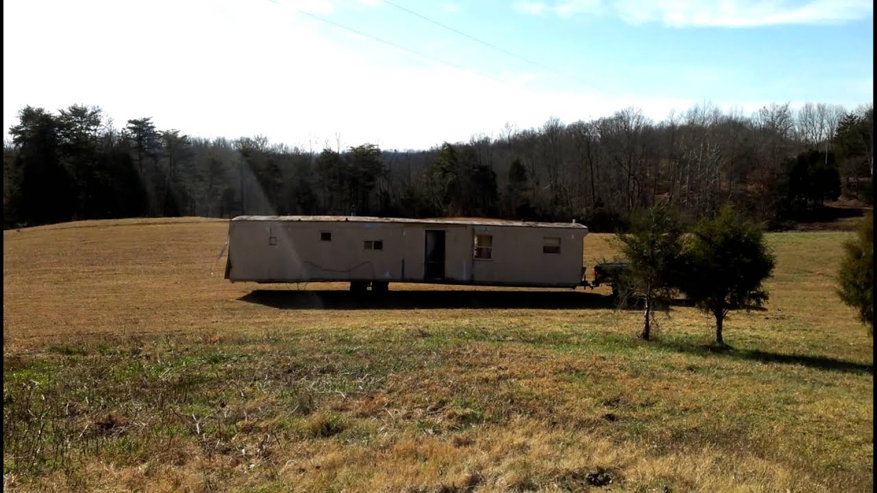Big Red pulling mobile home - YouTube