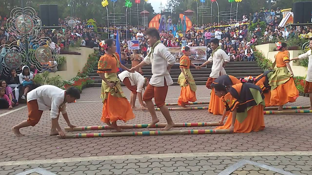 Tinikling dance by the TSU Performing Arts Dance Troupe - YouTube