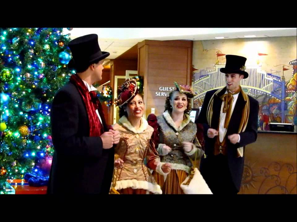 Disney's Paradise Pier Hotel Carolers perform "Rudolph the Red Nosed ...