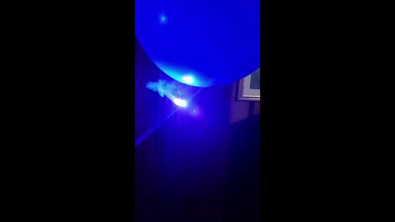 405 nm Blue Laser Beam Lights a Match and the Flame Pops a Balloon in ...