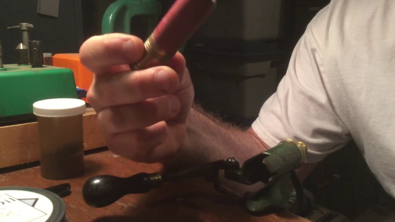 Loading 10 ga paper hull with roll crimp - YouTube