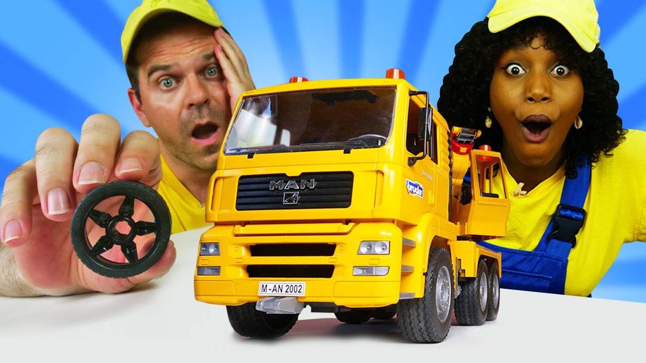 Role-play games with toy cars for kids. Toy trucks at the repair shop ...
