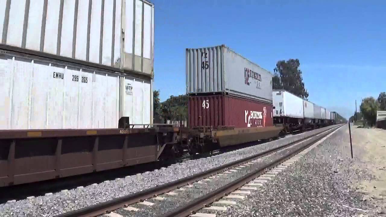 UP 8024 leads fast intermodal westbound - YouTube
