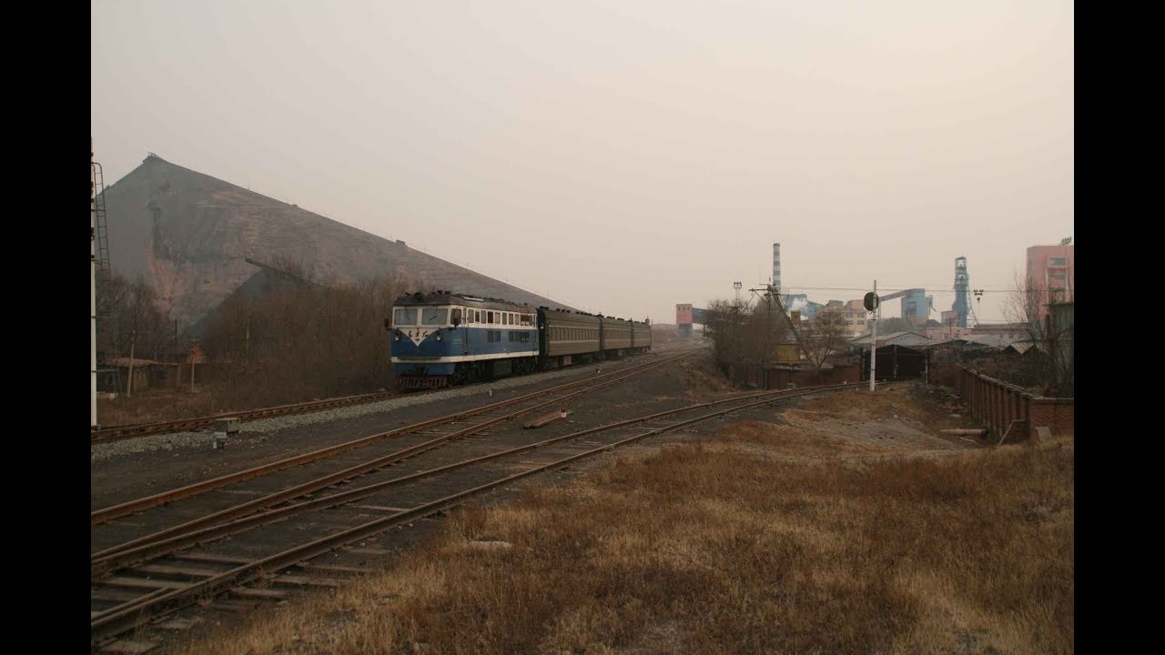 China diesel locomotive DFH3-2003 hauls the passenger train in the ...