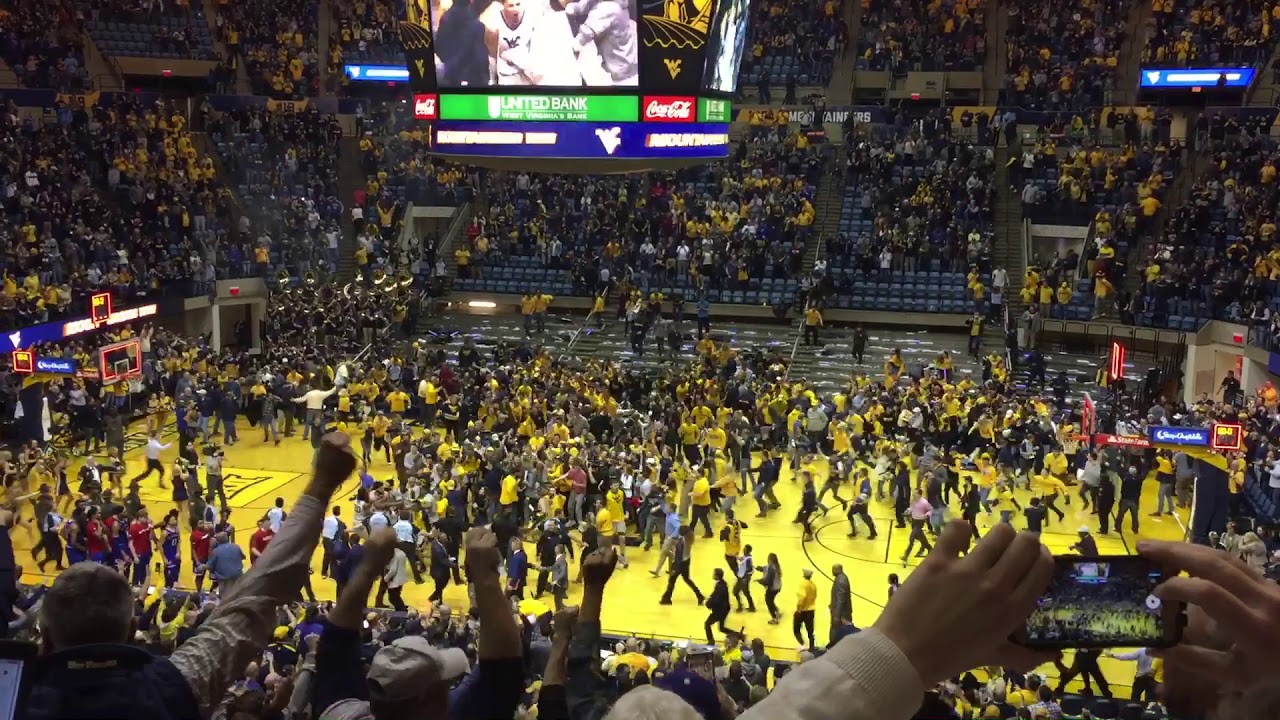 WVU Basketball: Fans storm the court following WVU’s upset win over ...