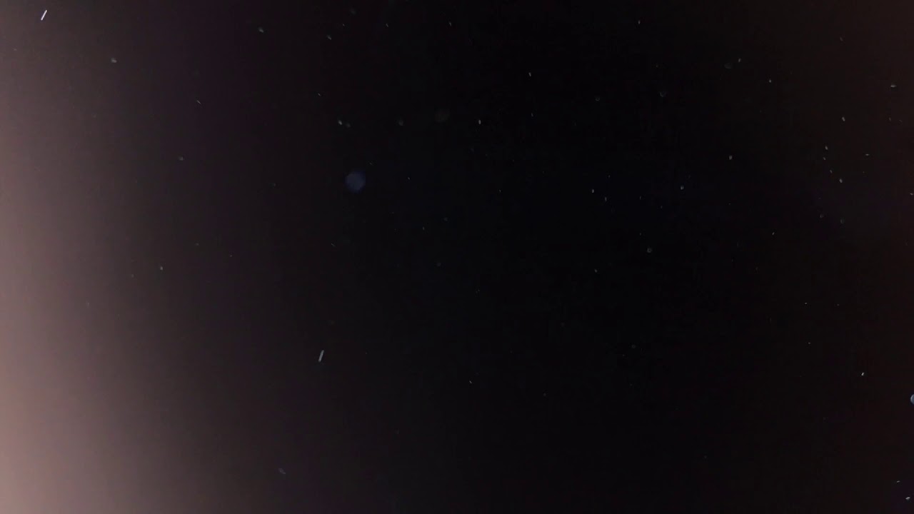 Shimmering Dust Particles In Black Space With Lens Flares - Free HD Vfx ...