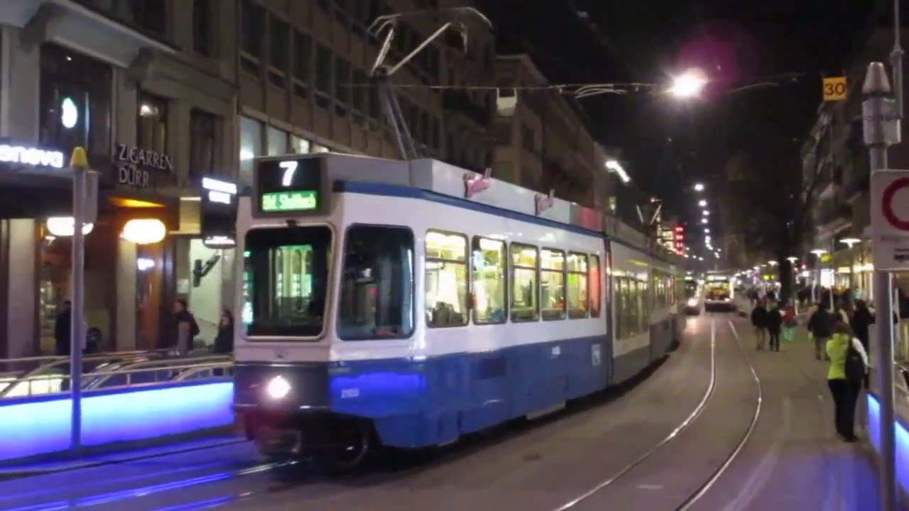 Switzerland: Zurich trams by night outside the Hauptbahnhof - YouTube